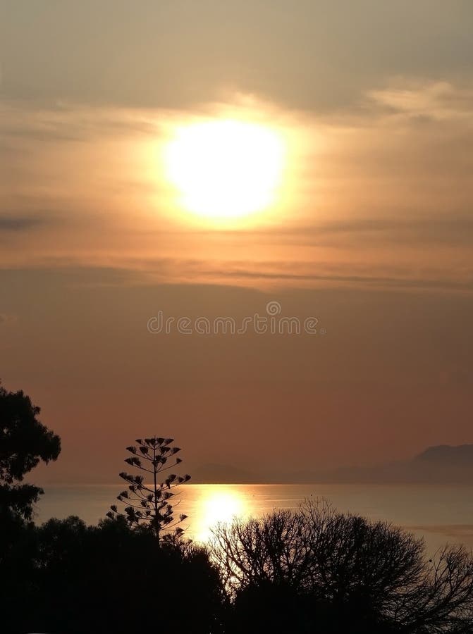 Sea sunset in Rhodes stock image. Image of bushes, rhodes - 102441445