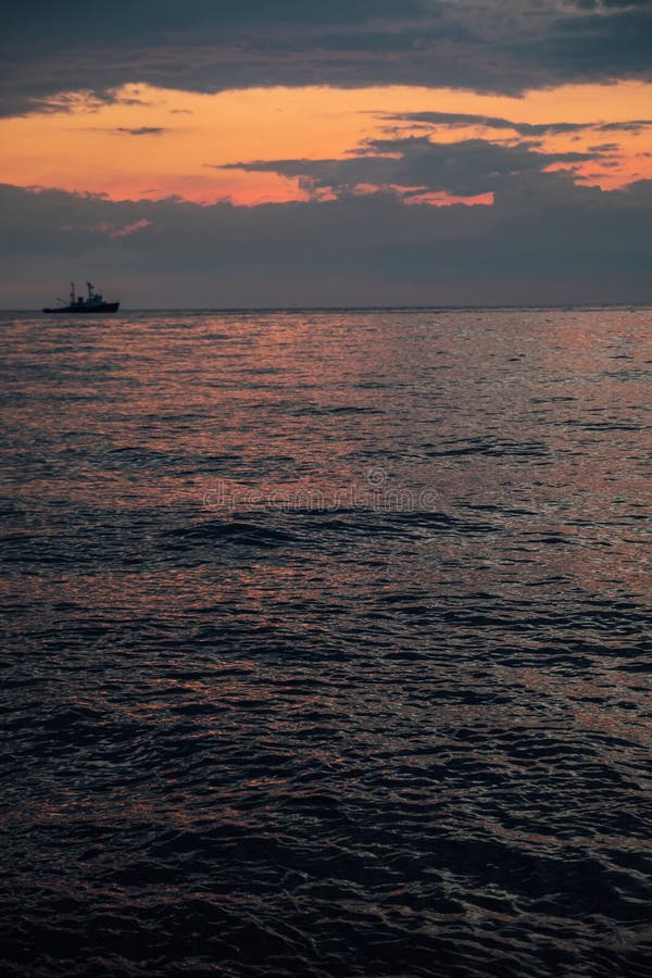 Sea with Sunset and Ship in the Distance Boat Trip Stock Photo - Image ...