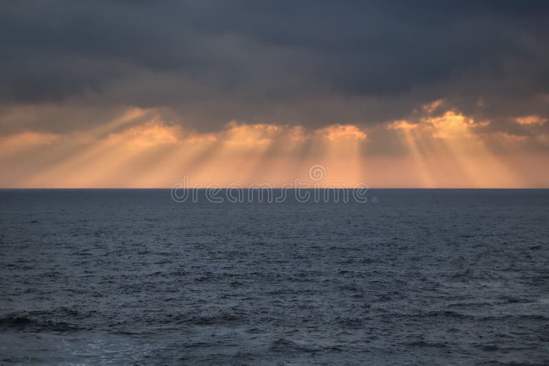 Sea sunset with sun beams stock photo. Image of peaceful - 174581516