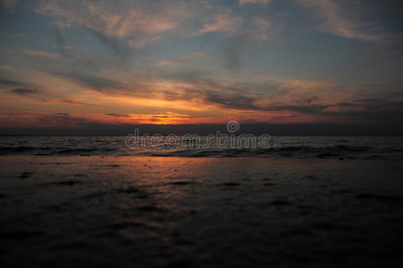 Sea sunset sun sky line stock photo. Image of evening - 223891404