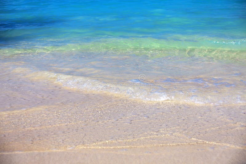 Sea surf on a sand beach stock photo. Image of south - 108413396