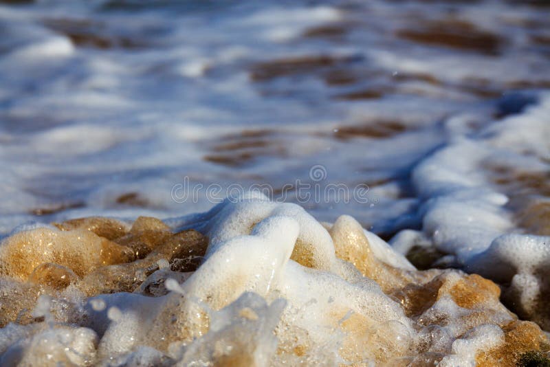 Sea Surf and Spray on the Beach Stock Photo - Image of seaside, cliff ...
