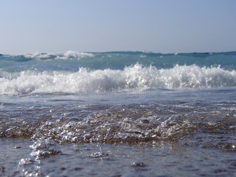 Sea Surf. the Sea Wave Breaks Down Against the Stones. Thousands ...