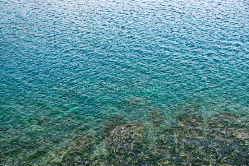 Sea Surface with Reflection. Stock Photo - Image of drop, flow: 69076368