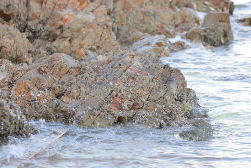 A Sea Surface, Rocks on the Beach Stock Image - Image of spray, ocean ...