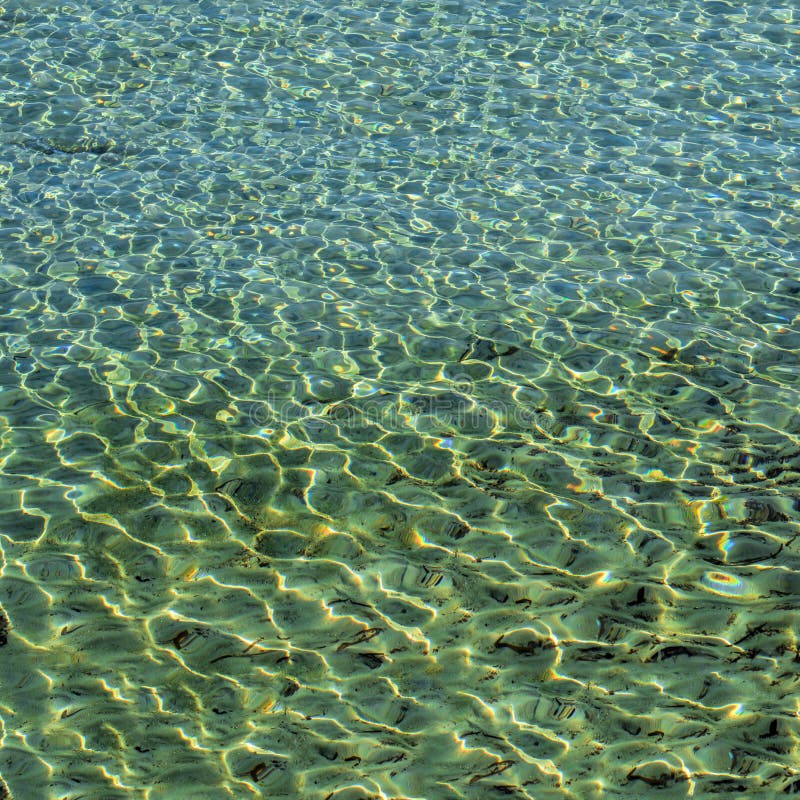 Sea surface of sandy shoal stock photo. Image of lights - 35329414