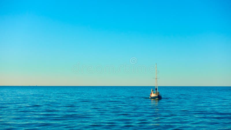 Sea view with a boat stock image. Image of south, evening - 193979325