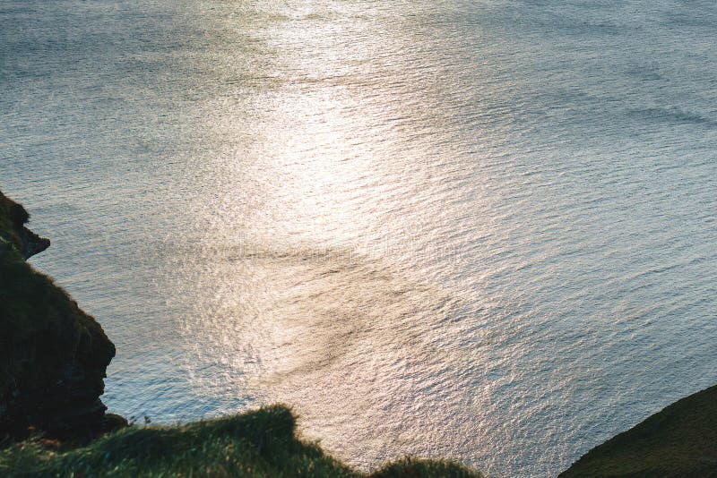 Sea view from hill stock image. Image of grass, sunset - 182019903