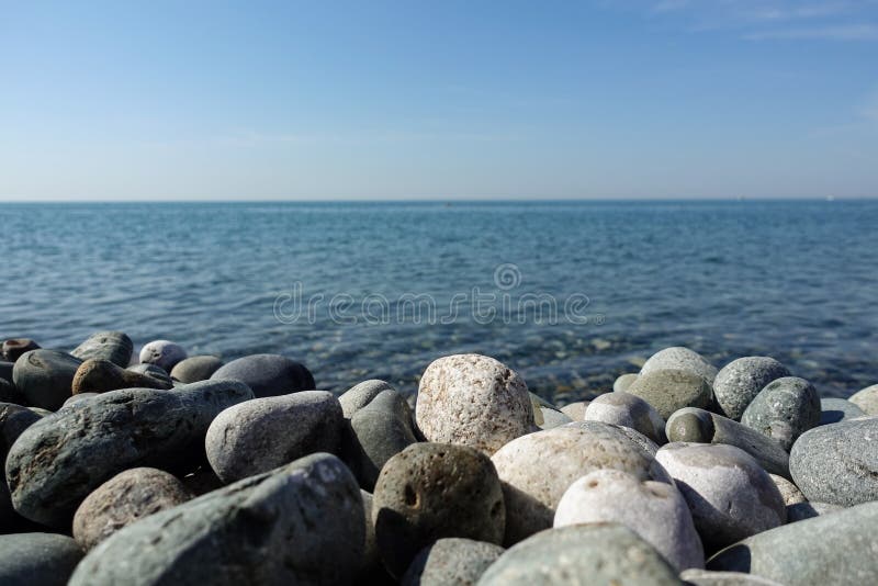 Sea View. Pebble Beach with Large Stones Stock Photo - Image of ground ...