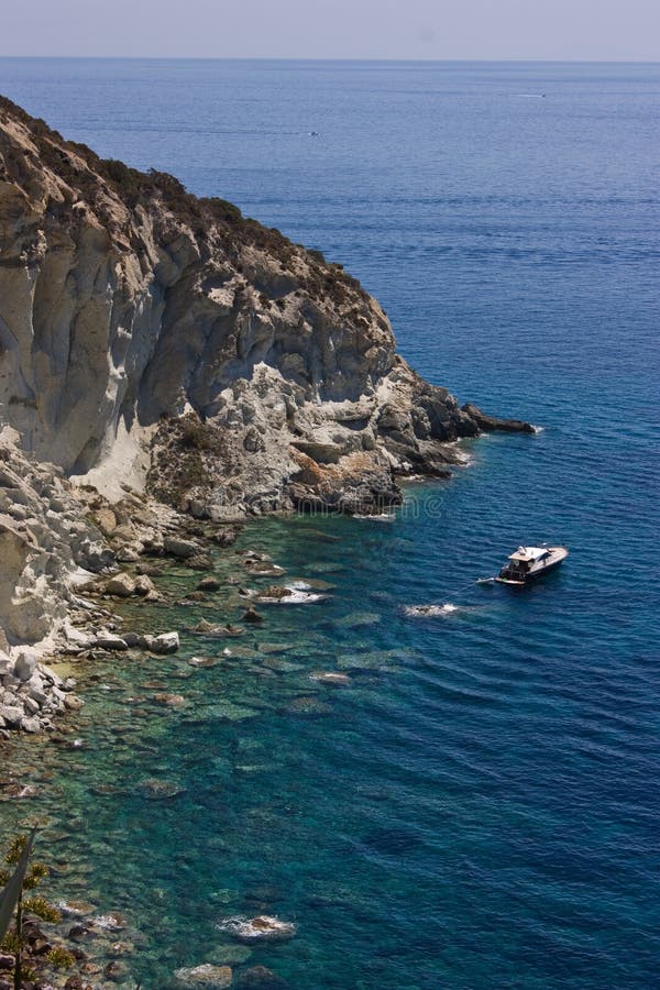 Sea View with Rocks and Boat Stock Image - Image of rock, coast: 6528999