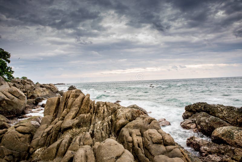 Sea View from a Rocky Side Under the Cloudy Sky Stock Image - Image of ...