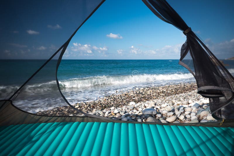 Sea view from tent stock photo. Image of coast, backpack - 67638900
