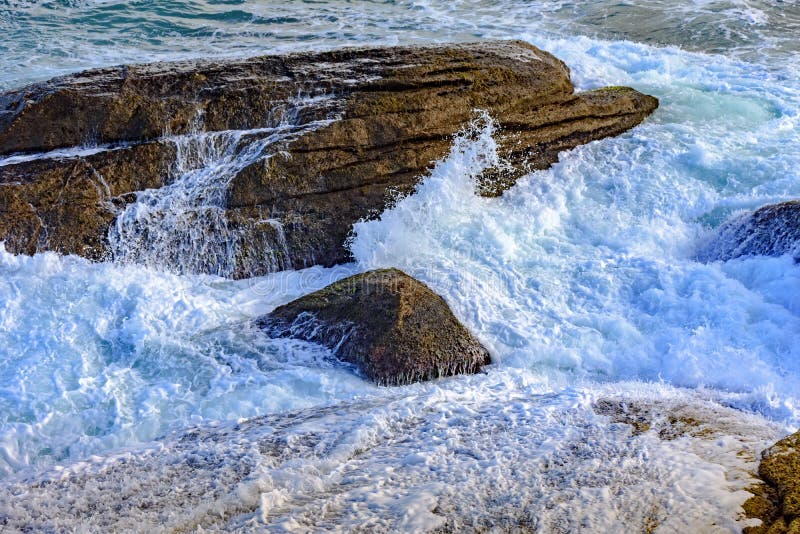 Sea Water Breaking Over the Rocks Stock Image - Image of flow, nature ...
