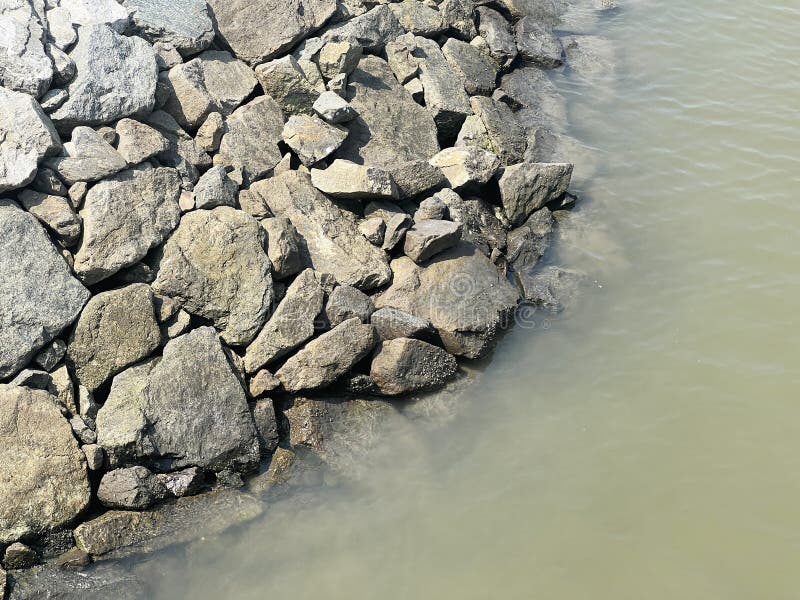 Sea water with rocks stock photo. Image of view, rock - 309114970