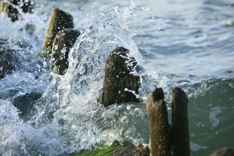 Sea water splash stock image. Image of breakwater, pier - 13268337