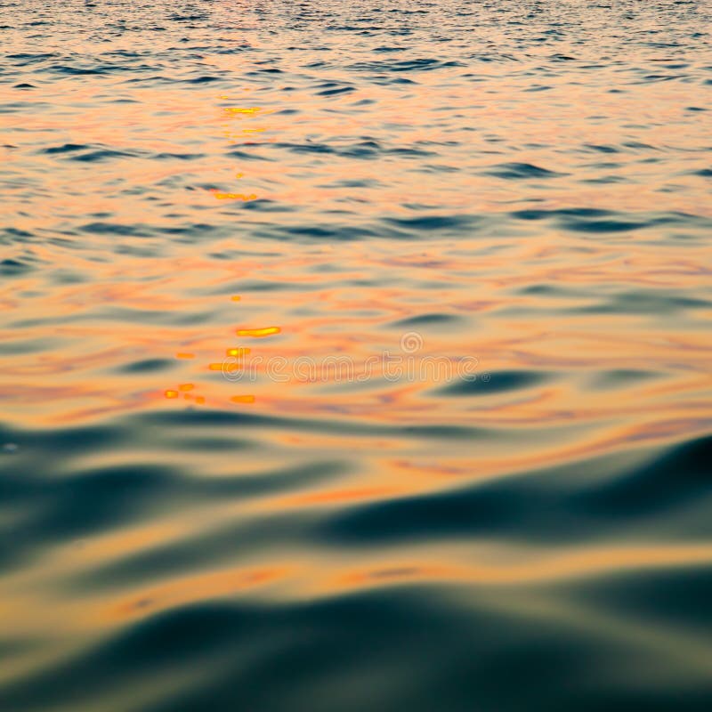 Sea water at sundown stock image. Image of bright, blurry - 243244871