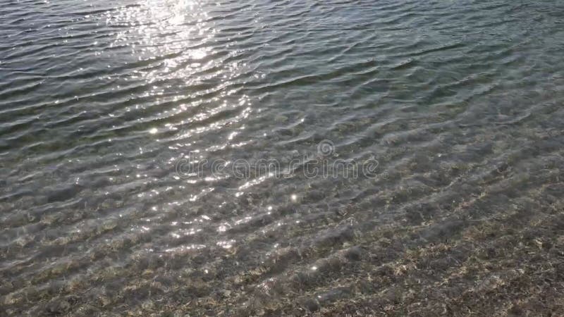 Sea Water and Sunlit Highlights and Pebbles, Water Stock Video - Video ...