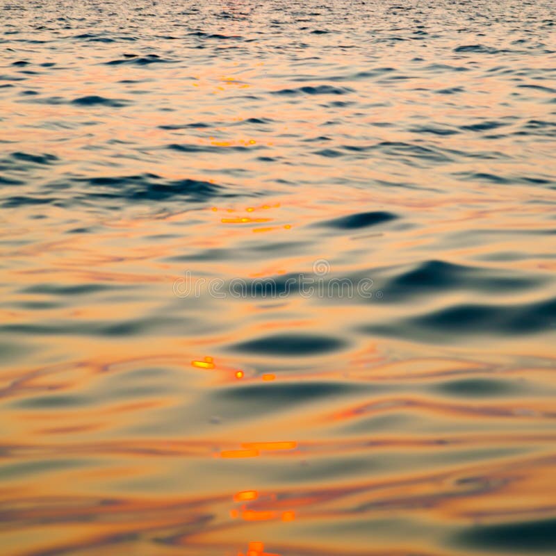 Sea water at sunset stock image. Image of bright, defocused - 241778209