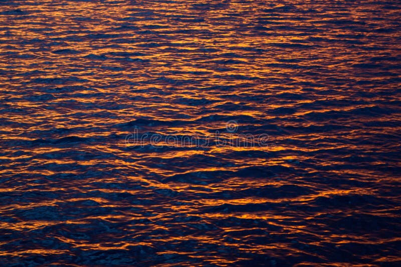 Sea Water Texture at Sunset Stock Photo - Image of flare, illuminated ...
