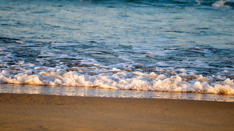 Sea Water and Waves with Beach at Sunrise Stock Photo - Image of wall ...