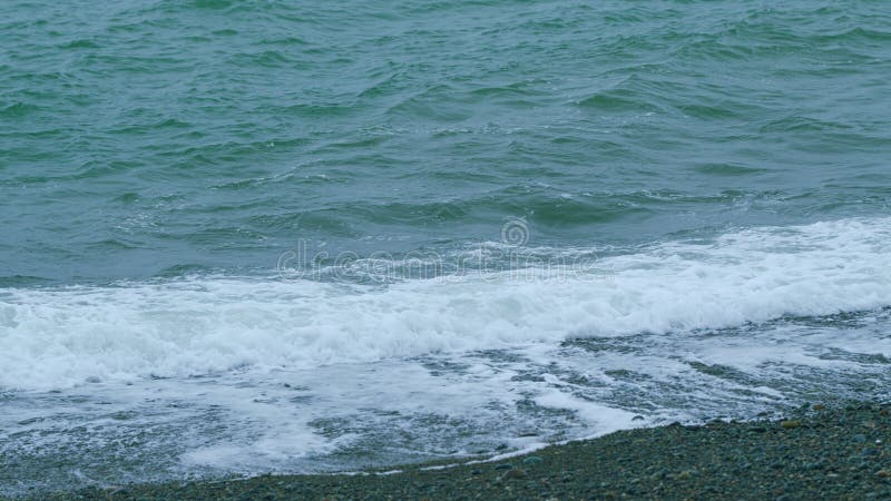 Sea Water Waves. Wave after Wave Swept Towards Shore. Slow Motion ...