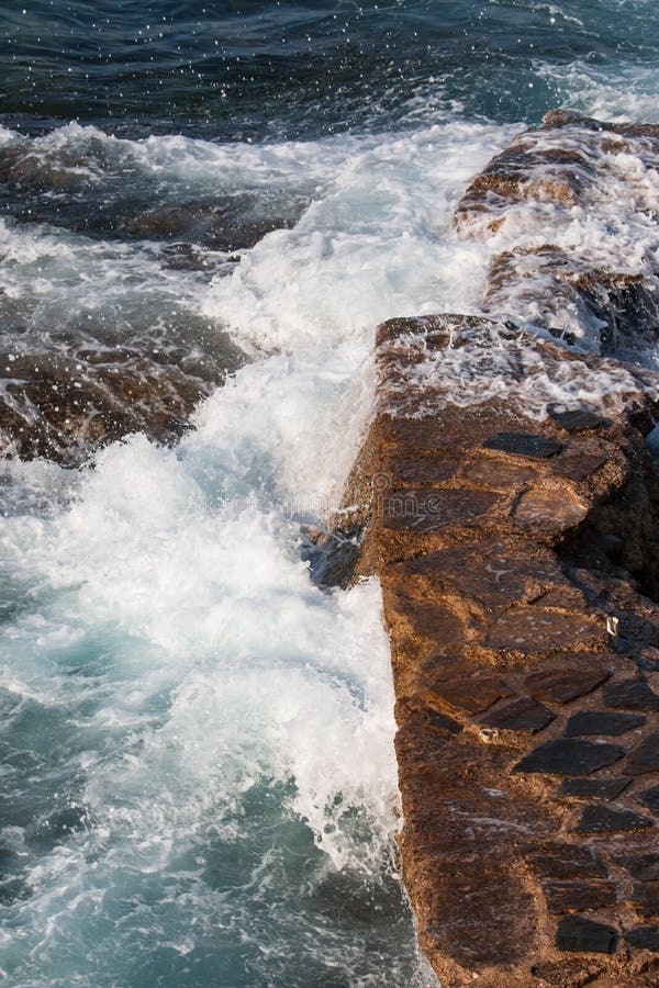 Sea wave beats on stones. stock photo. Image of stone - 185096878
