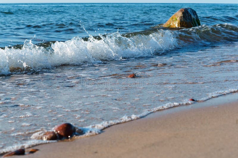 Sea wave beats on stones. stock photo. Image of stone - 185096878