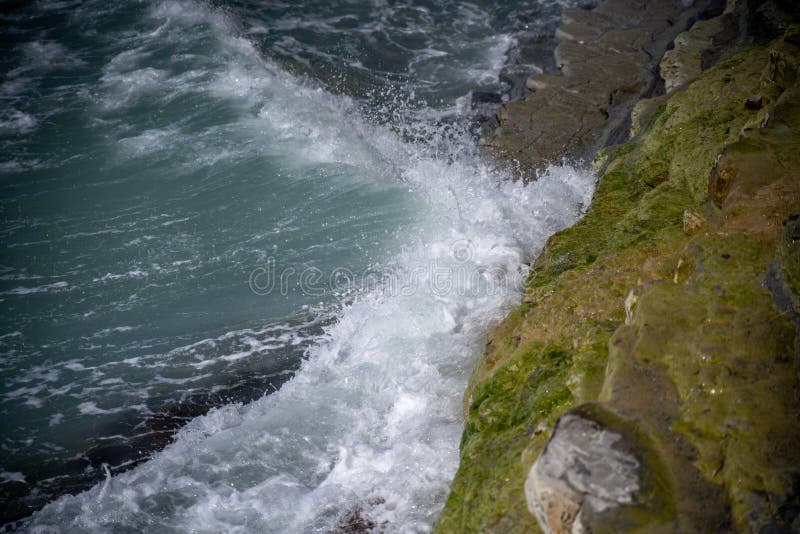 The Sea Wave Hitting the Stone Mossy Shore Stock Image - Image of blue ...