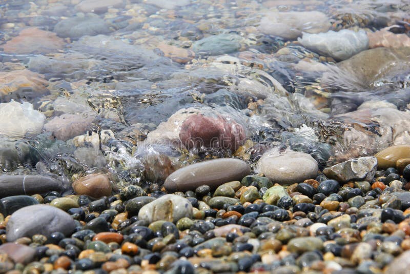 The Coastal Shingle of the Seabed in Clear Water Stock Image - Image of ...