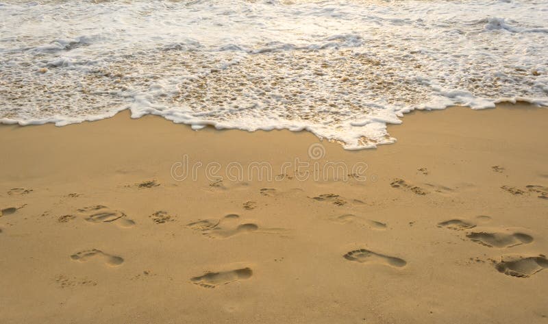 Sea Wave and Many Foot Print on the Beach Background Stock Image ...