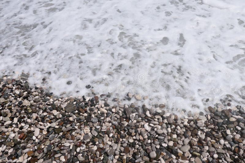 Pebble beach stock image. Image of pebbles, shore, smooth - 153850775