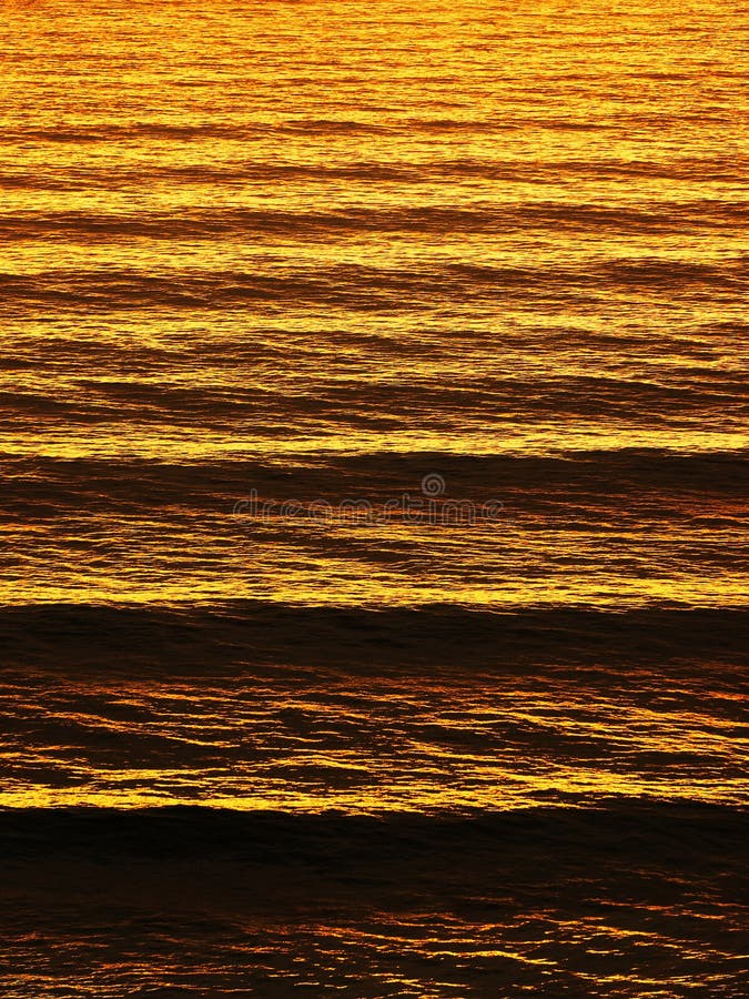 Sea wave ripples at sunset stock image. Image of beautiful - 57181745