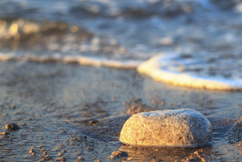 Sea Wave on Sand and Stone at Sunrise Stock Image - Image of abstract ...