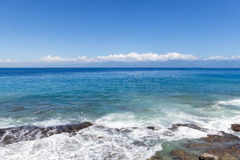 Sea wave splash over rock stock photo. Image of drone - 255554746