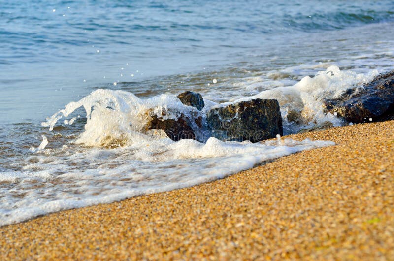Sea Wave Washes Over Stones on the Beach Stock Photo - Image of shore ...