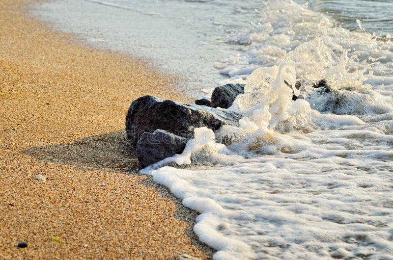 Sea Wave Washes Over Stones on the Beach Stock Image - Image of ...