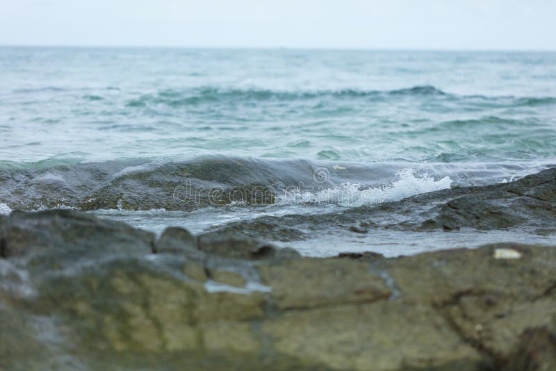 Sea waves ashore close up stock image. Image of rocks - 165833323