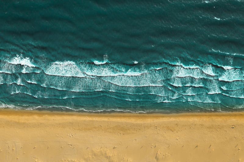 Sea waves on the beach stock photo. Image of summer - 198499240