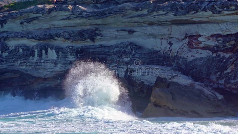 Sea Waves Beating Reefs Under the Coastal Cliff, Splashing Water Stock ...