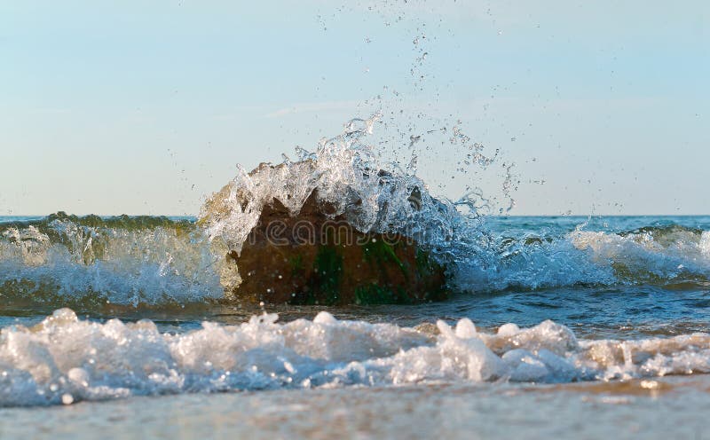The Wave Breaks on a Rock, the Sea Waves are Beating on the Rocks on ...
