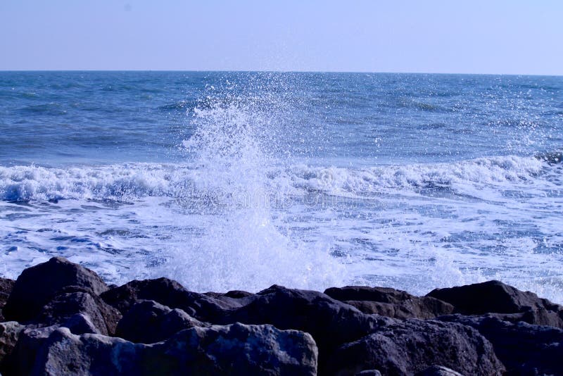 Sea Waves Coming Towards Rocks with Algae Stock Image - Image of cold ...