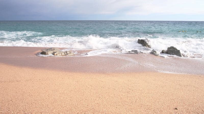 Sea Waves Crash on the Beach Sand in the Evening, Front View Stock ...