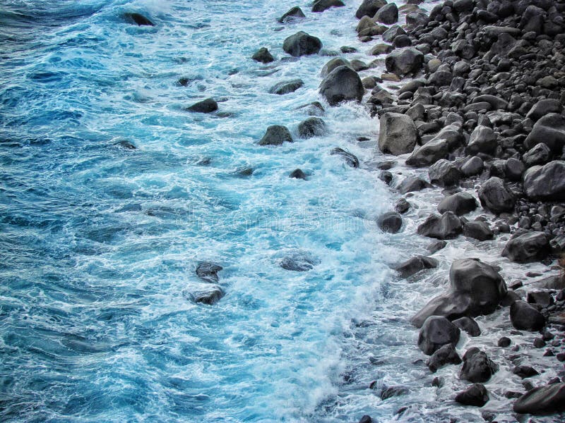Grey Rocks Cliff Overlooking Marsh During Daytime Picture. Image: 83065989