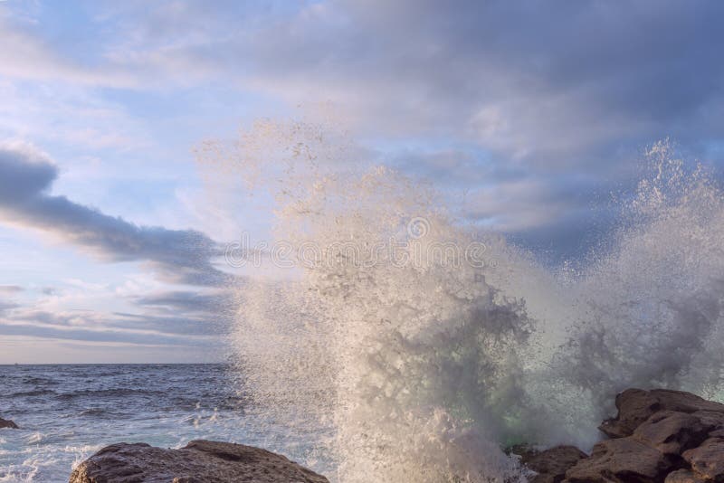 Sea Waves Hitting Rocks on the Galician Coast at Sunset Stock Image ...