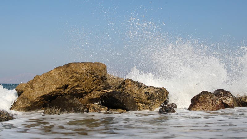 Sea Waves Hitting Rocks stock photo. Image of foam, danger - 129370446