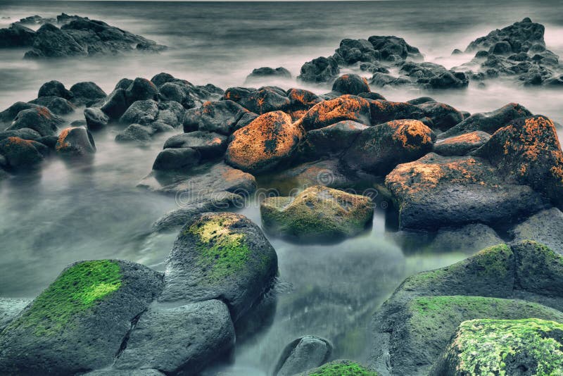 Sea Waves Lash Line Impact Rock on the Beach Stock Image - Image of ...