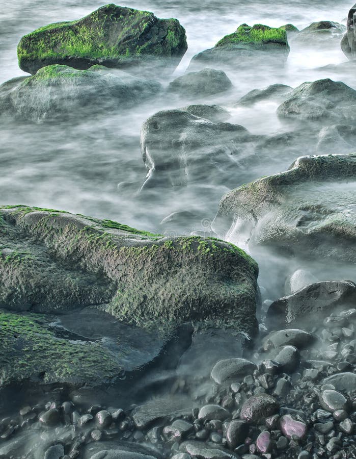 Sea Waves Lash Line Impact Rock on the Beach Stock Image - Image of ...