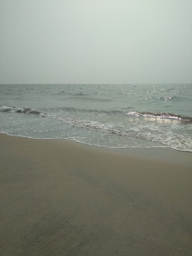 Sea waves at noon time stock image. Image of lighting - 223902337