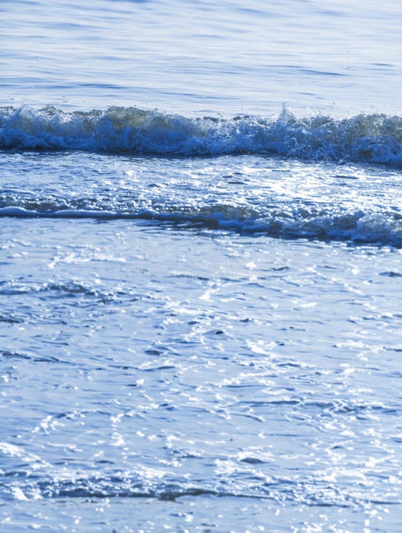 Blue Sea Waves with Reflection Stock Photo - Image of sunrise, evening ...