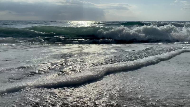 Sea Waves Roll on the Sandy Shore. Stock Footage - Video of seascape ...